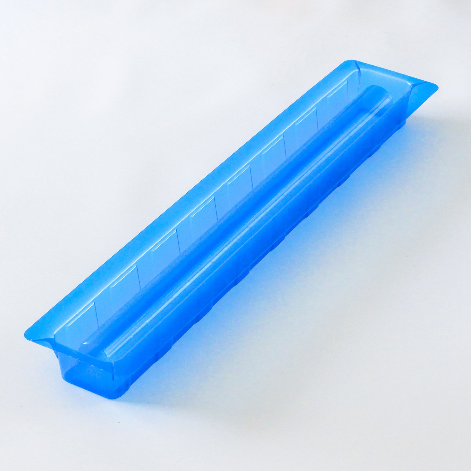 Moule insert à bûche en plastique thermoformé rigide